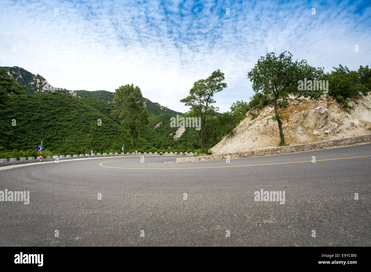 Steep mountain road Stock Photo - Alamy