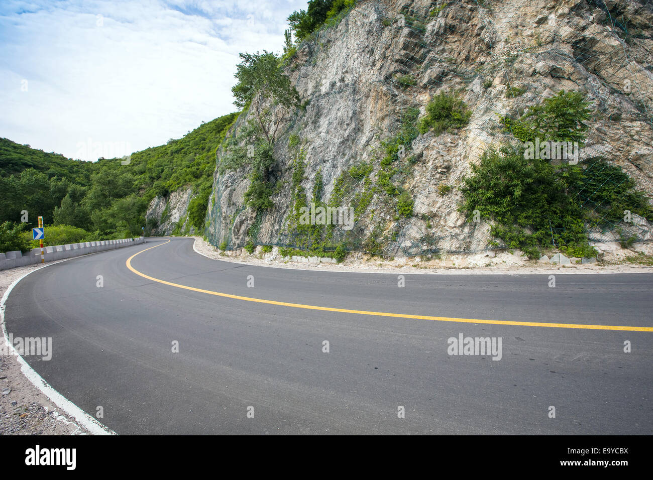 Steep mountain road Stock Photo - Alamy