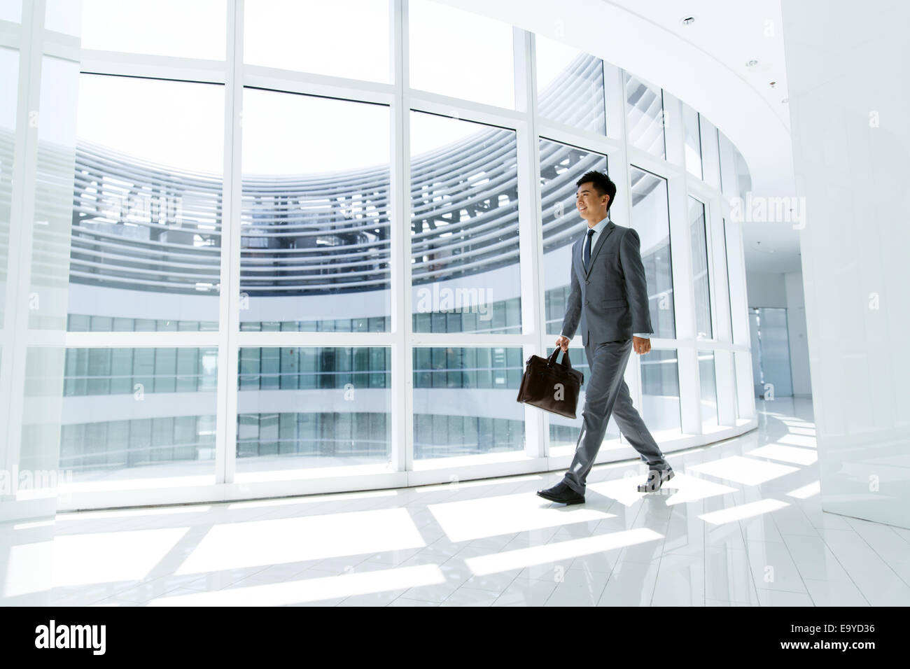 Walking into office building hi-res stock photography and images - Alamy
