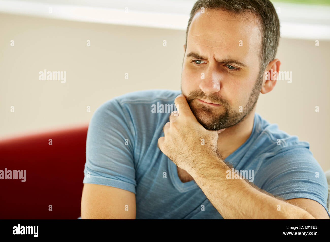 Business man thoughtful expression hi-res stock photography and images ...