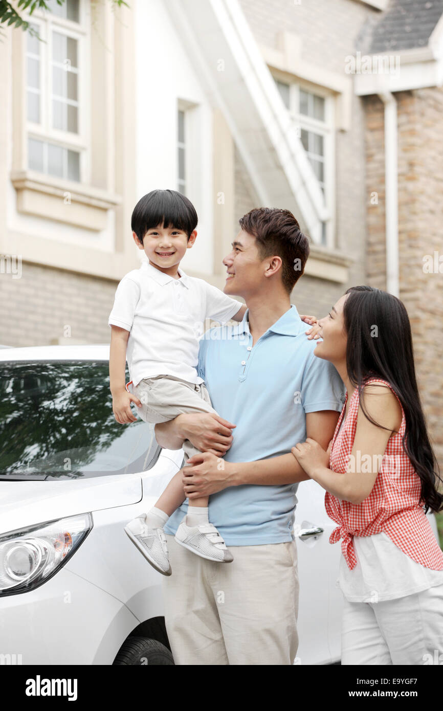 Boy with his parents Stock Photo - Alamy