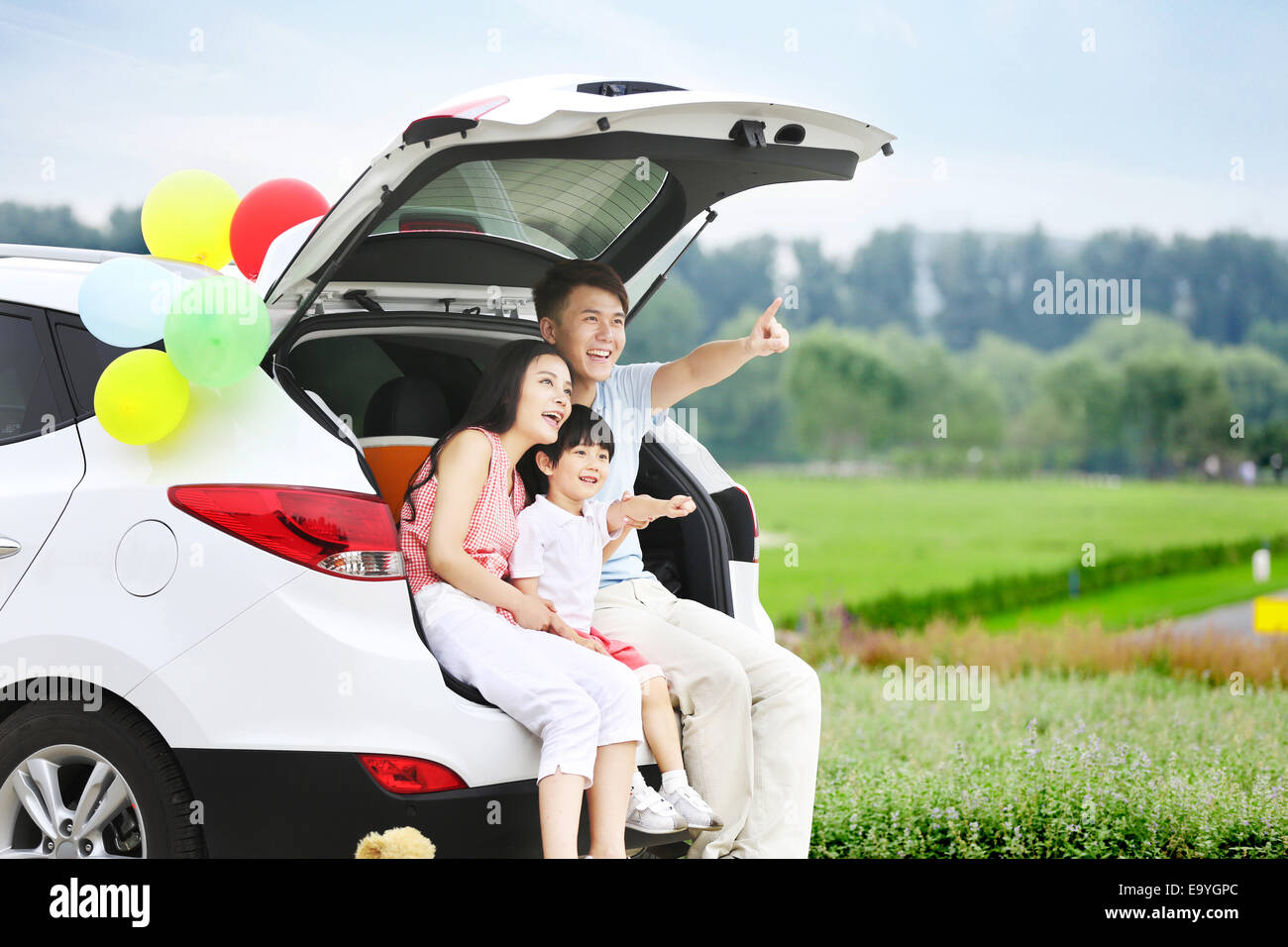 Boy with his parents Stock Photo - Alamy