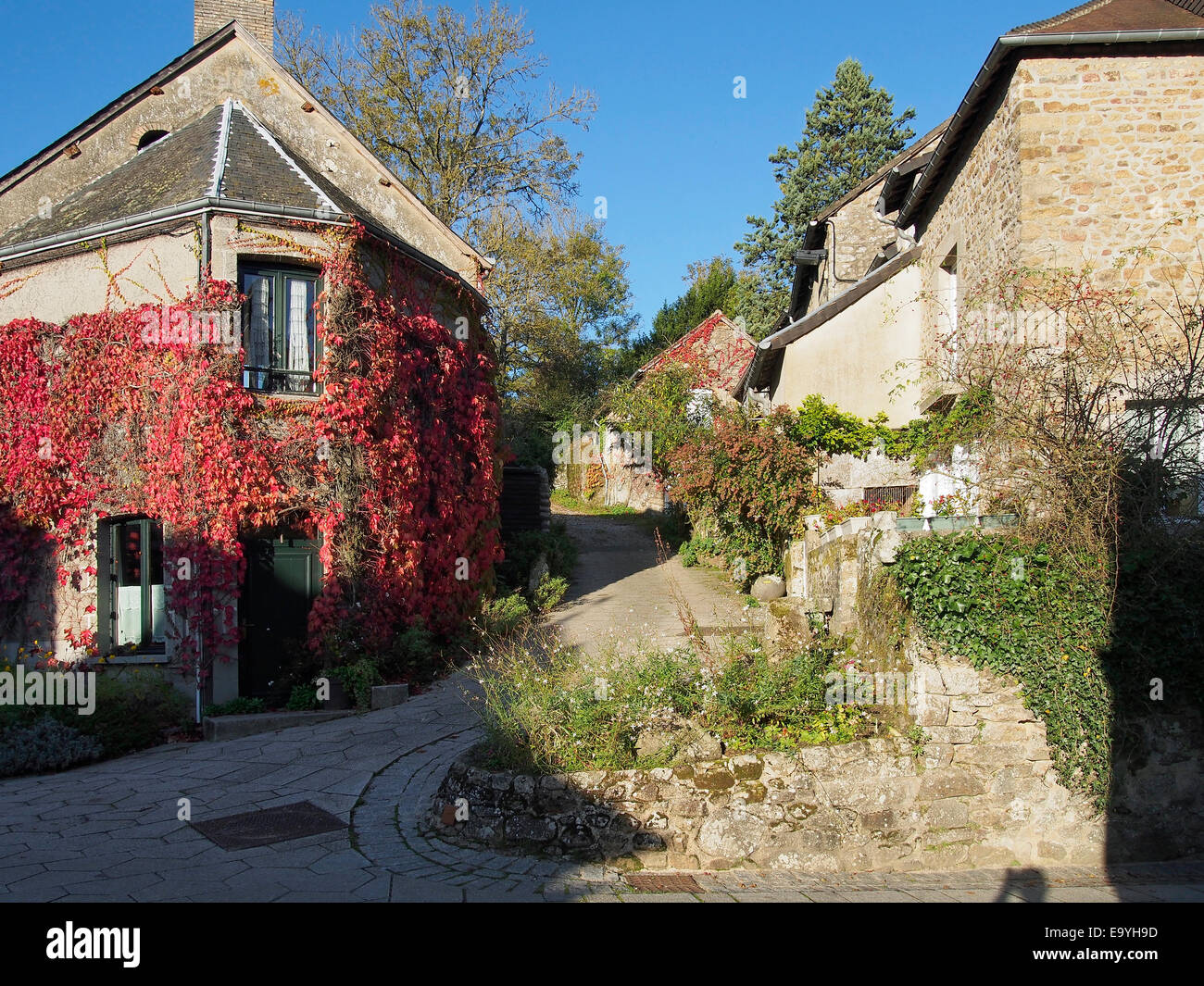 Pretty stone houses in the beautiful historic village of Saint-Céneri ...