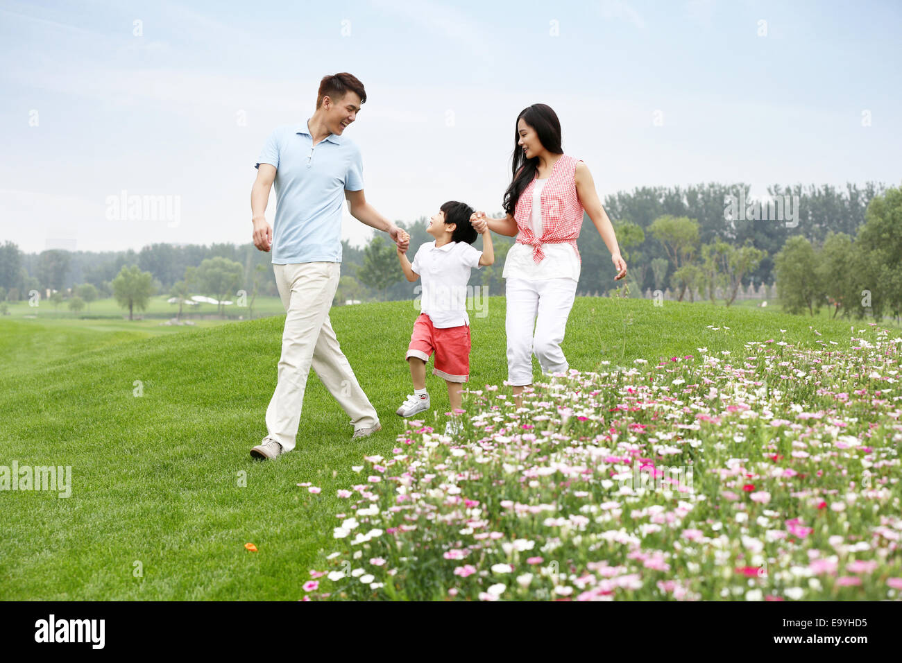 Boy with his parents Stock Photo - Alamy