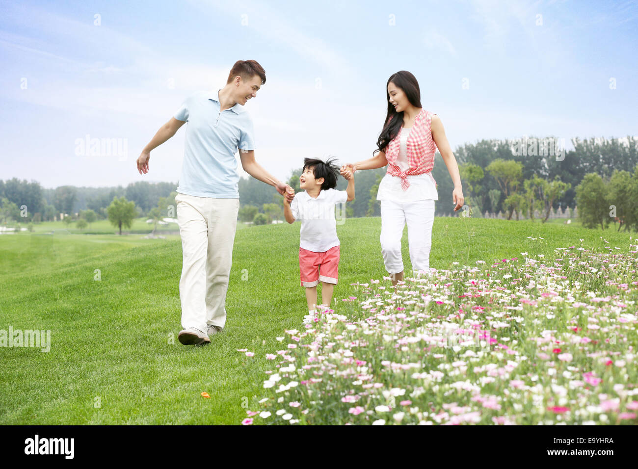 Boy with his parents Stock Photo - Alamy