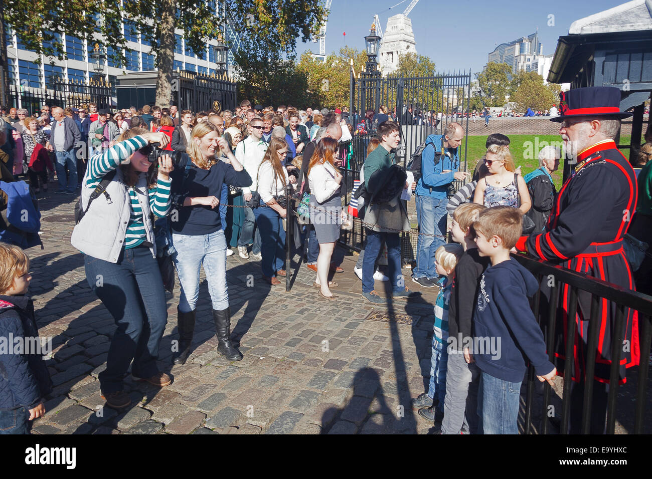 The Tower of London A Beefeater posing for visitors at the Tower Hill ...
