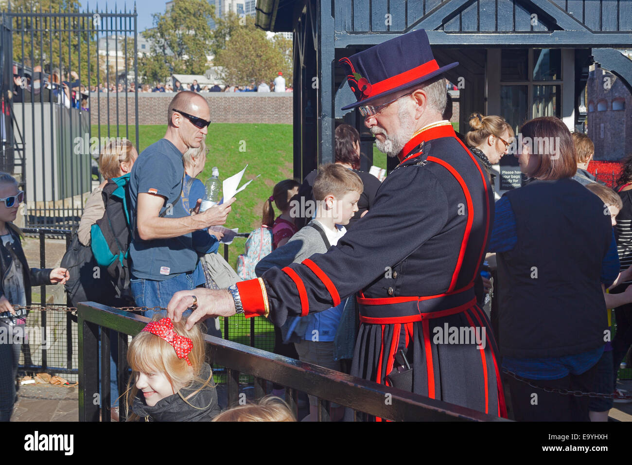 The Tower of London A Beefeater engaging with a young visitor at the ...