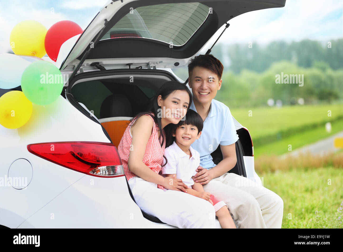 Boy with his parents Stock Photo - Alamy