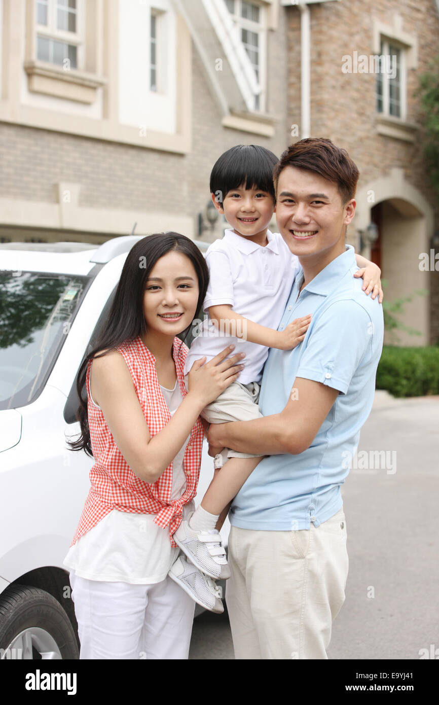 Boy with his parents Stock Photo - Alamy