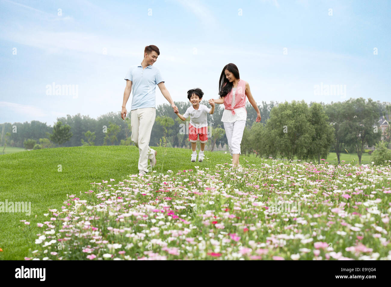 Boy with his parents Stock Photo - Alamy