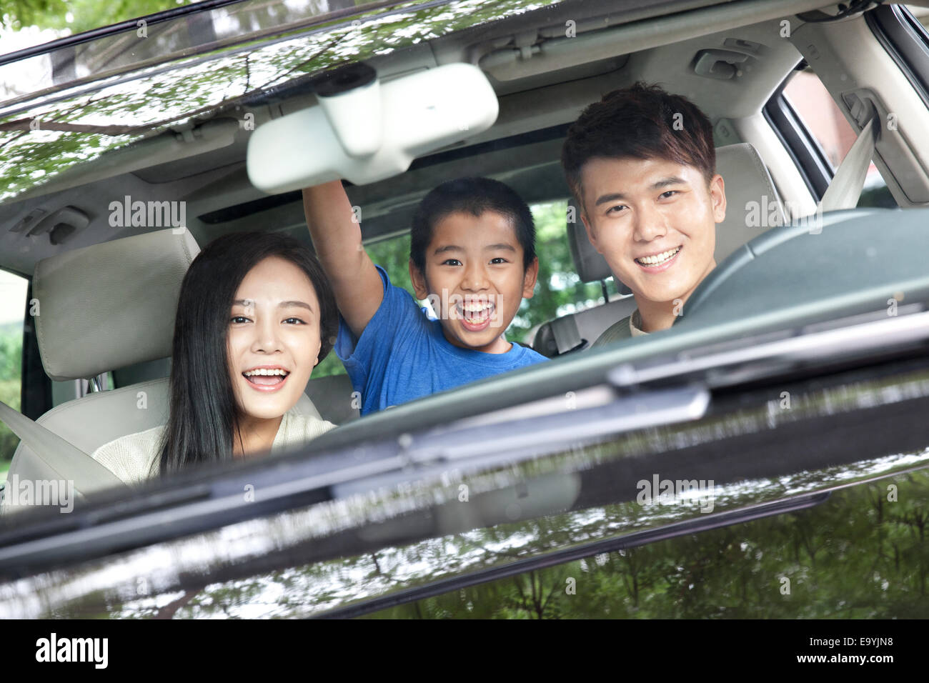 Boy with his parents on travel Stock Photo - Alamy
