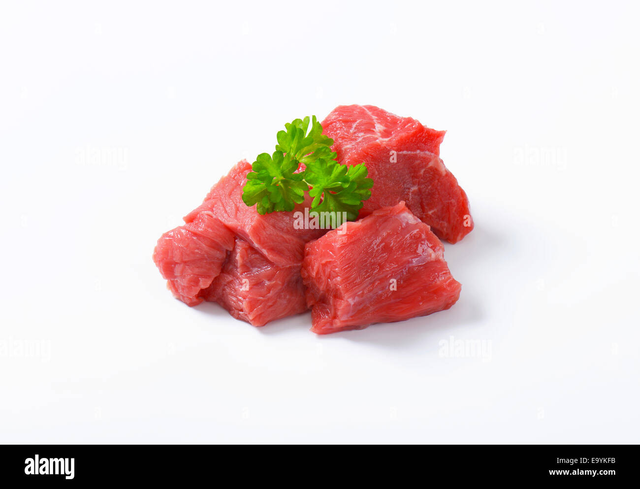 Raw beef cut into cubes Stock Photo - Alamy