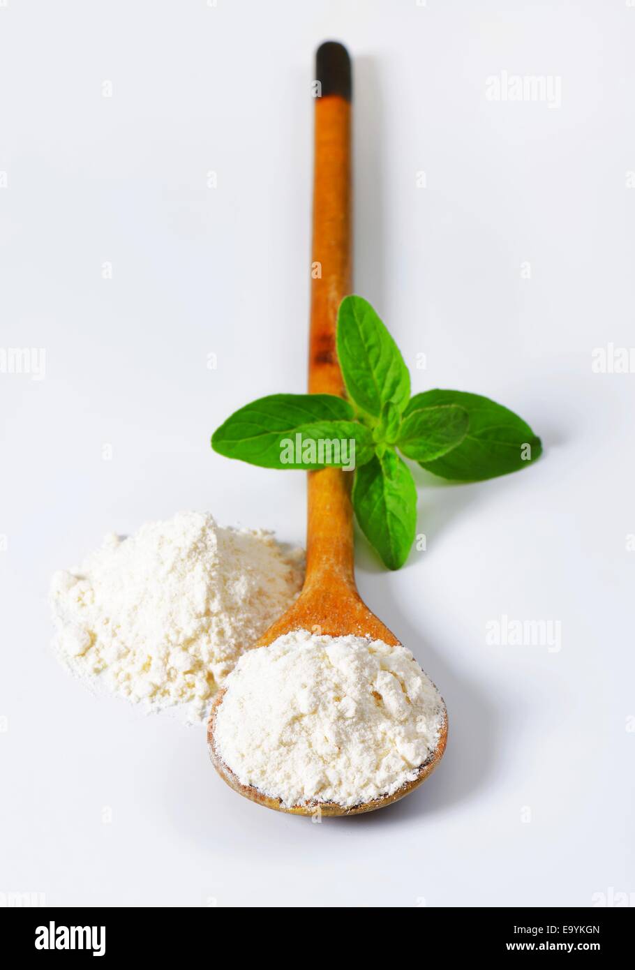 Soft wheat flour on wooden spoon Stock Photo - Alamy