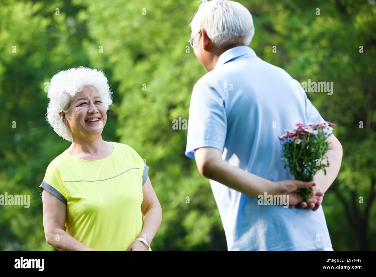 Couple three people behind them hi-res stock photography and images - Alamy