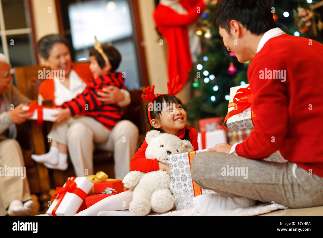 Family on Christmas Stock Photo - Alamy