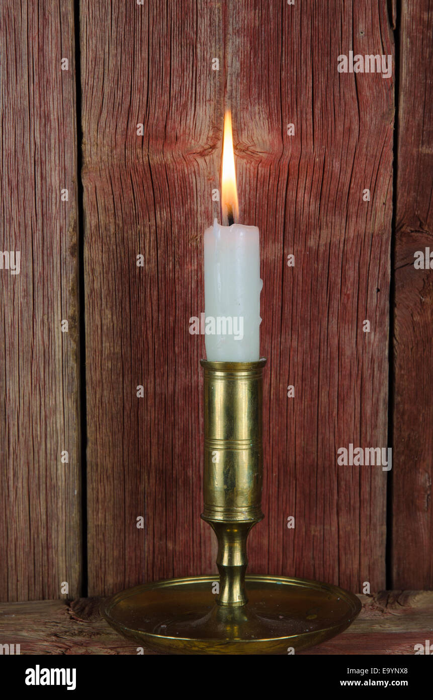 Single candle burning hi-res stock photography and images - Alamy
