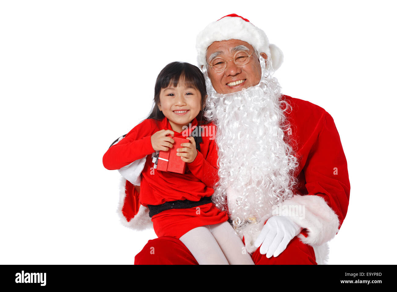 Santa Claus with girl Stock Photo - Alamy