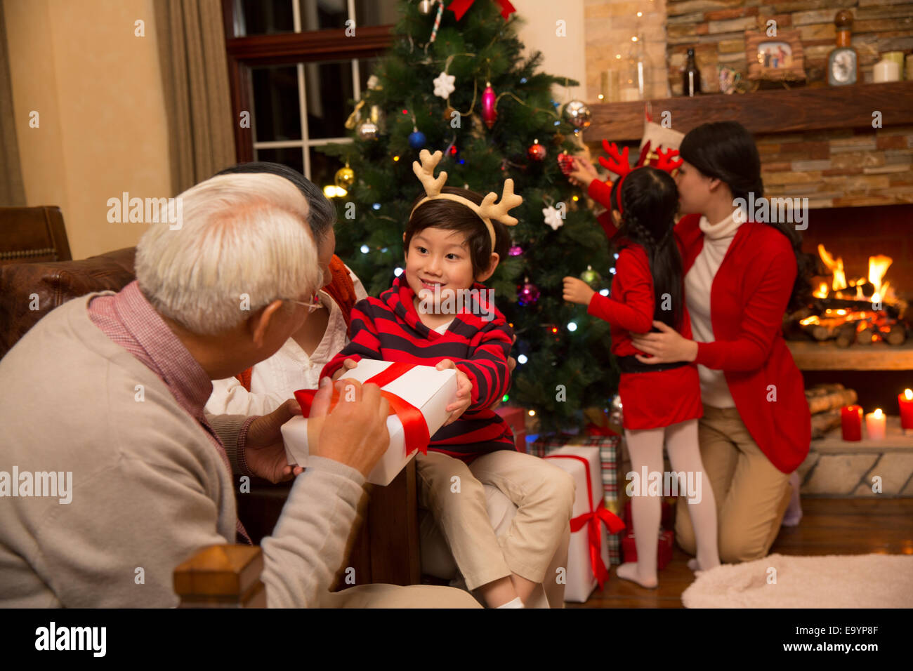 Family on Christmas Stock Photo - Alamy