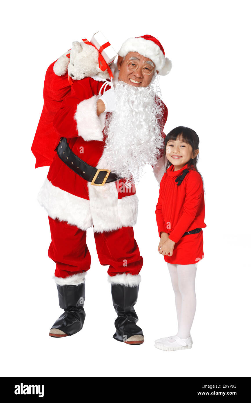 Santa Claus with girl Stock Photo - Alamy