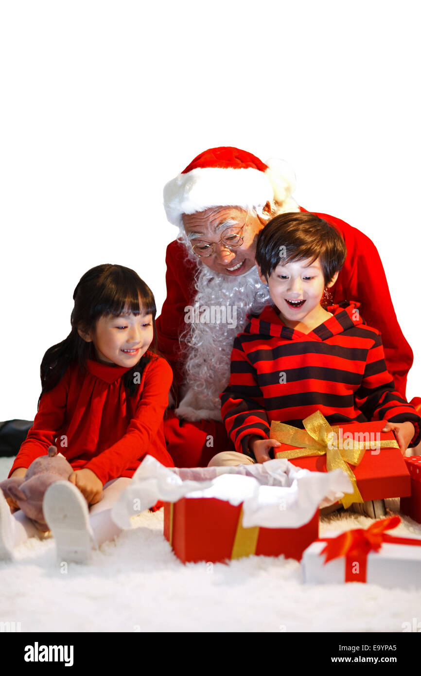 Santa Claus with children Stock Photo - Alamy