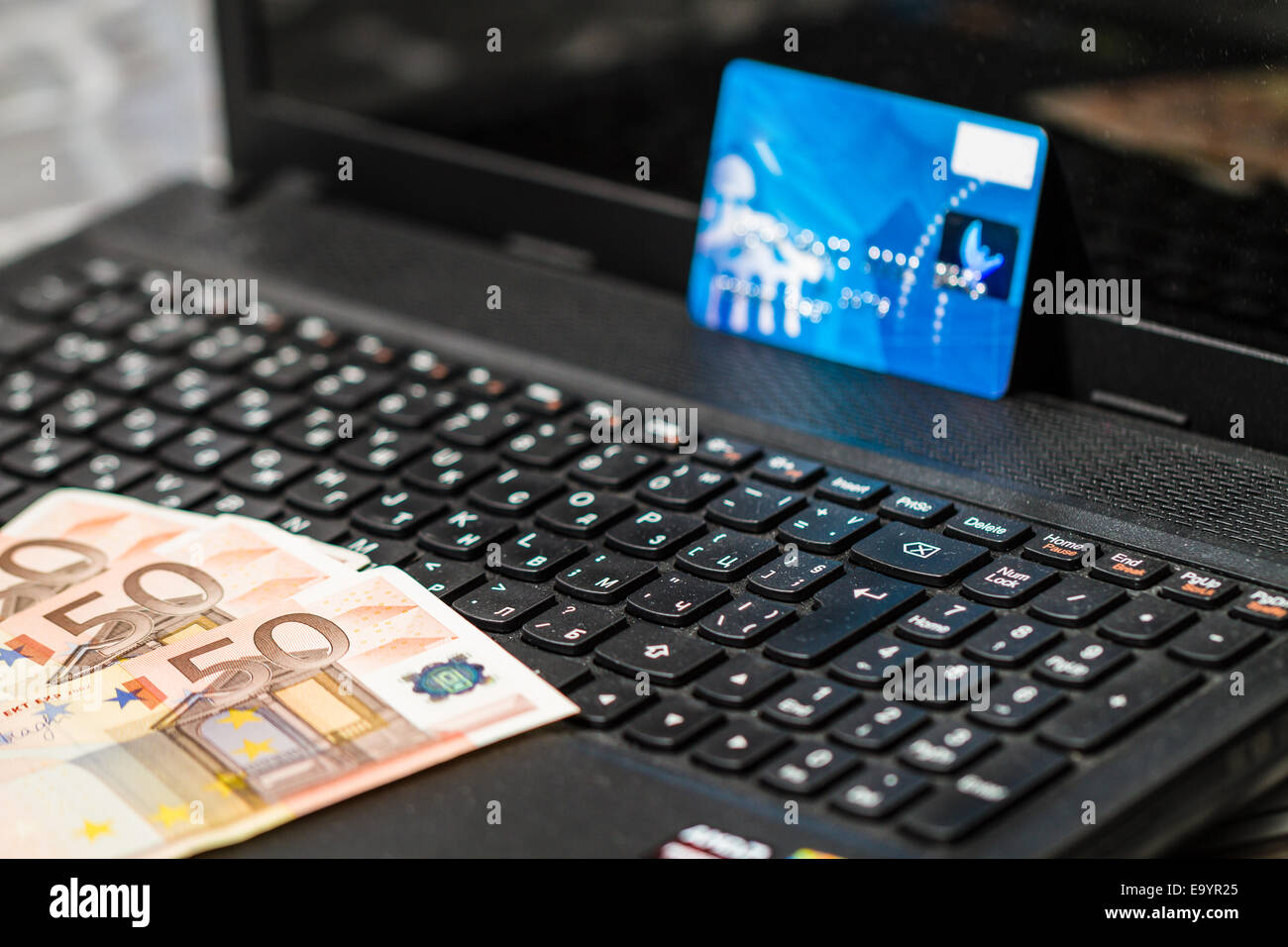 Money and credit card on keyboard. Online banking Stock Photo - Alamy
