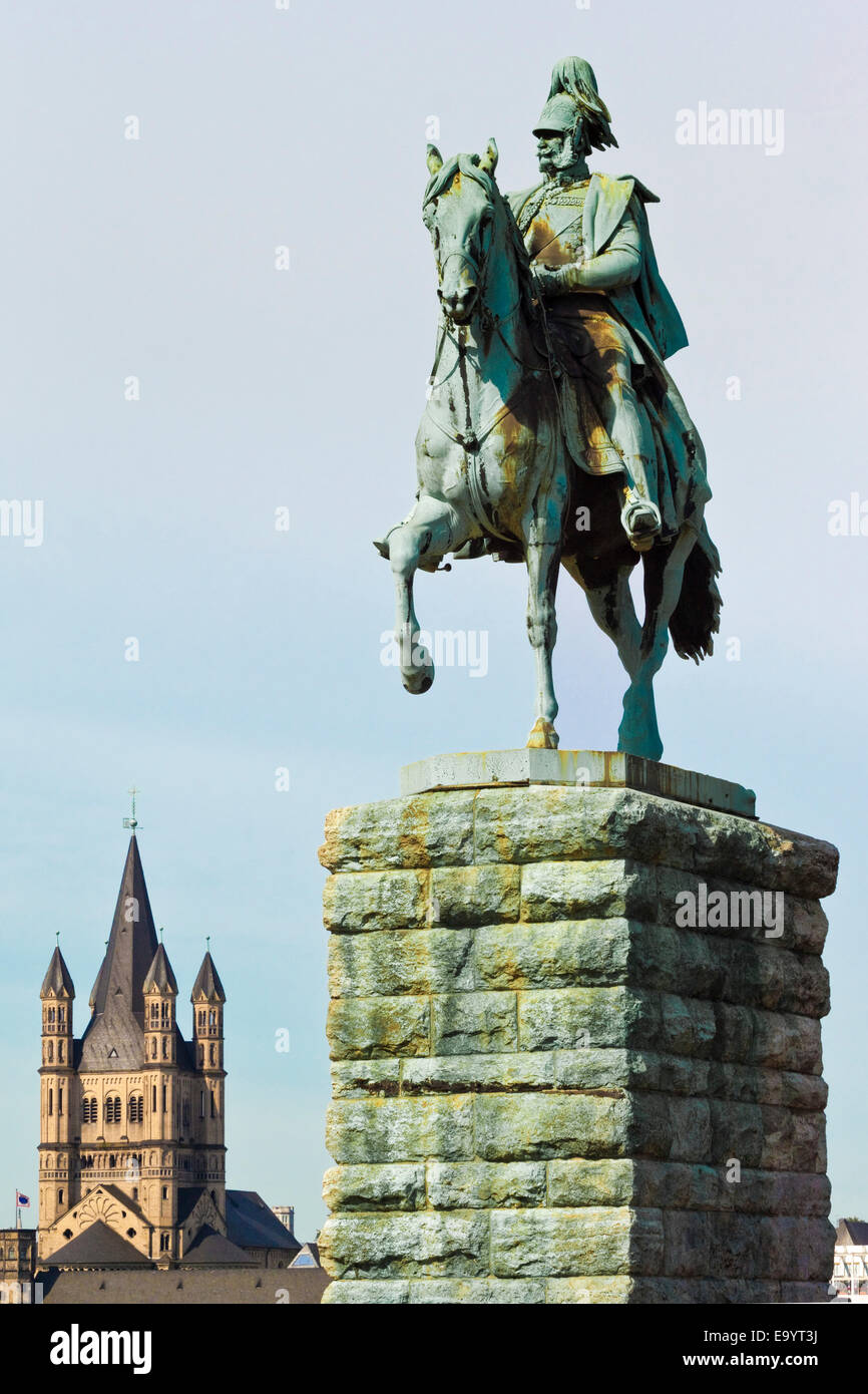 Statue of Kaiser William 1 on horse with the Great Saint Martin Church ...