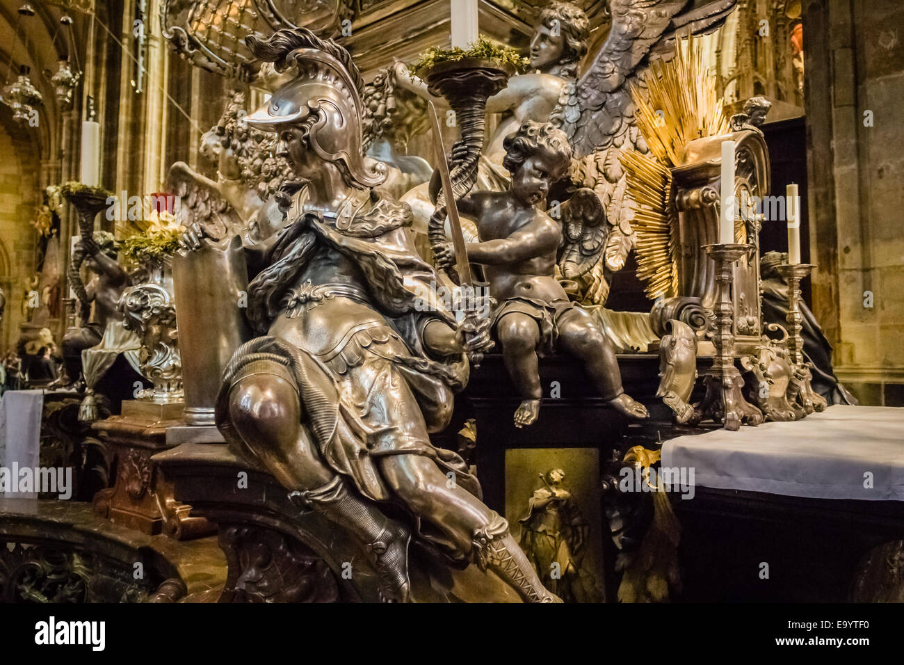 Golden altar with statues and catholic objects and symbols inside Saint ...