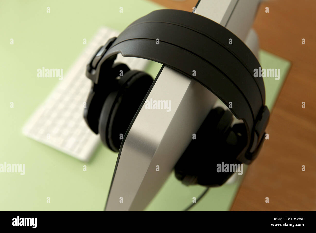 Computer with VOIP headset hanging on the screen Stock Photo - Alamy