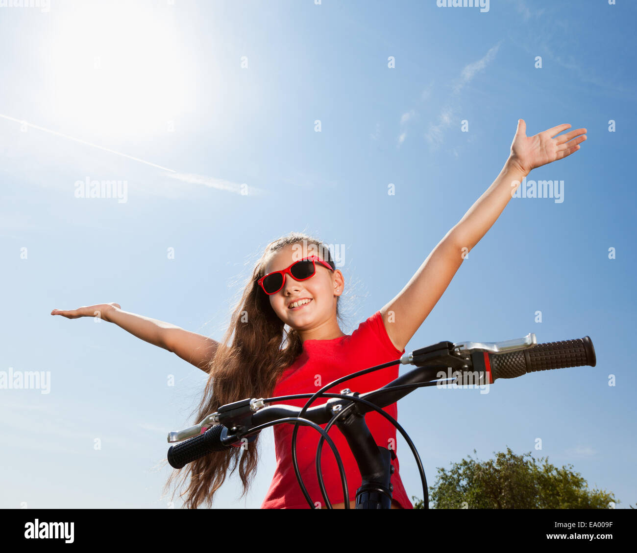 teenage girl on a bicycle in summer day Stock Photo - Alamy