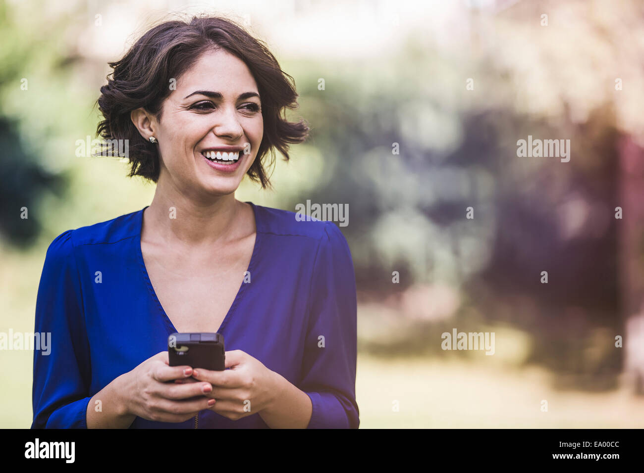 Woman And Texting And Laughing High Resolution Stock Photography and ...