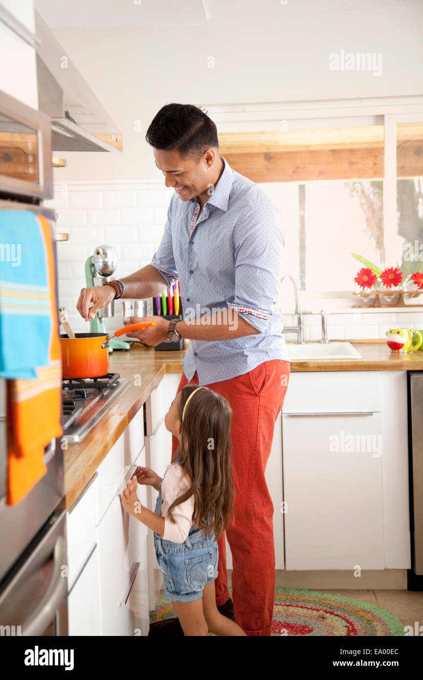 Father and daughter cooking in kitchen Stock Photo - Alamy