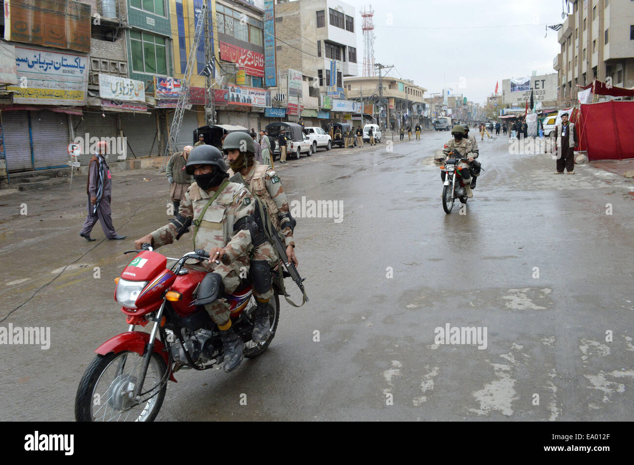 Quetta. 4th Nov, 2014. Pakistani rangers patrol on the road due to ...
