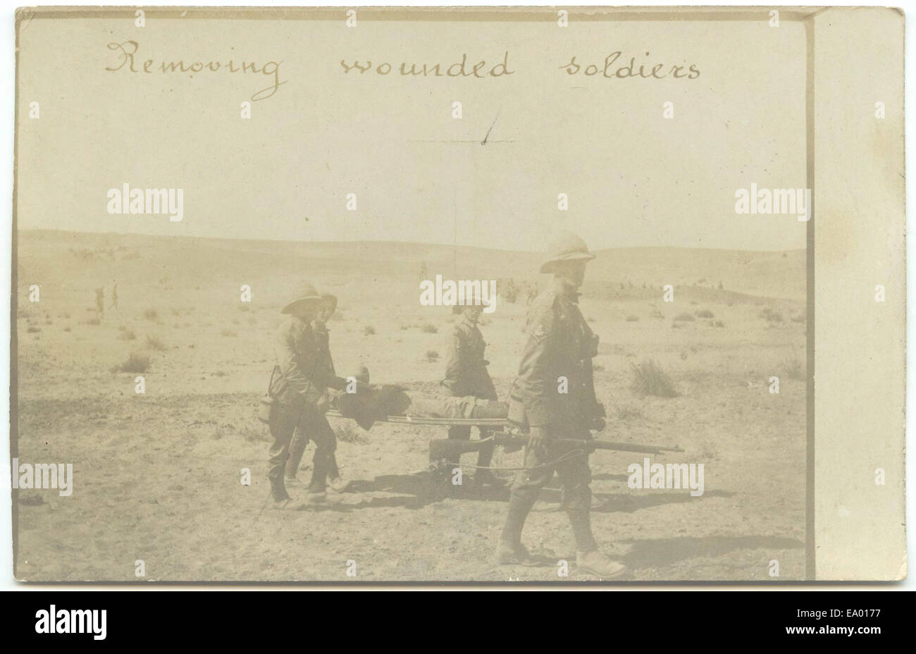 A photograph depicting the process of removing wounded soldiers from ...