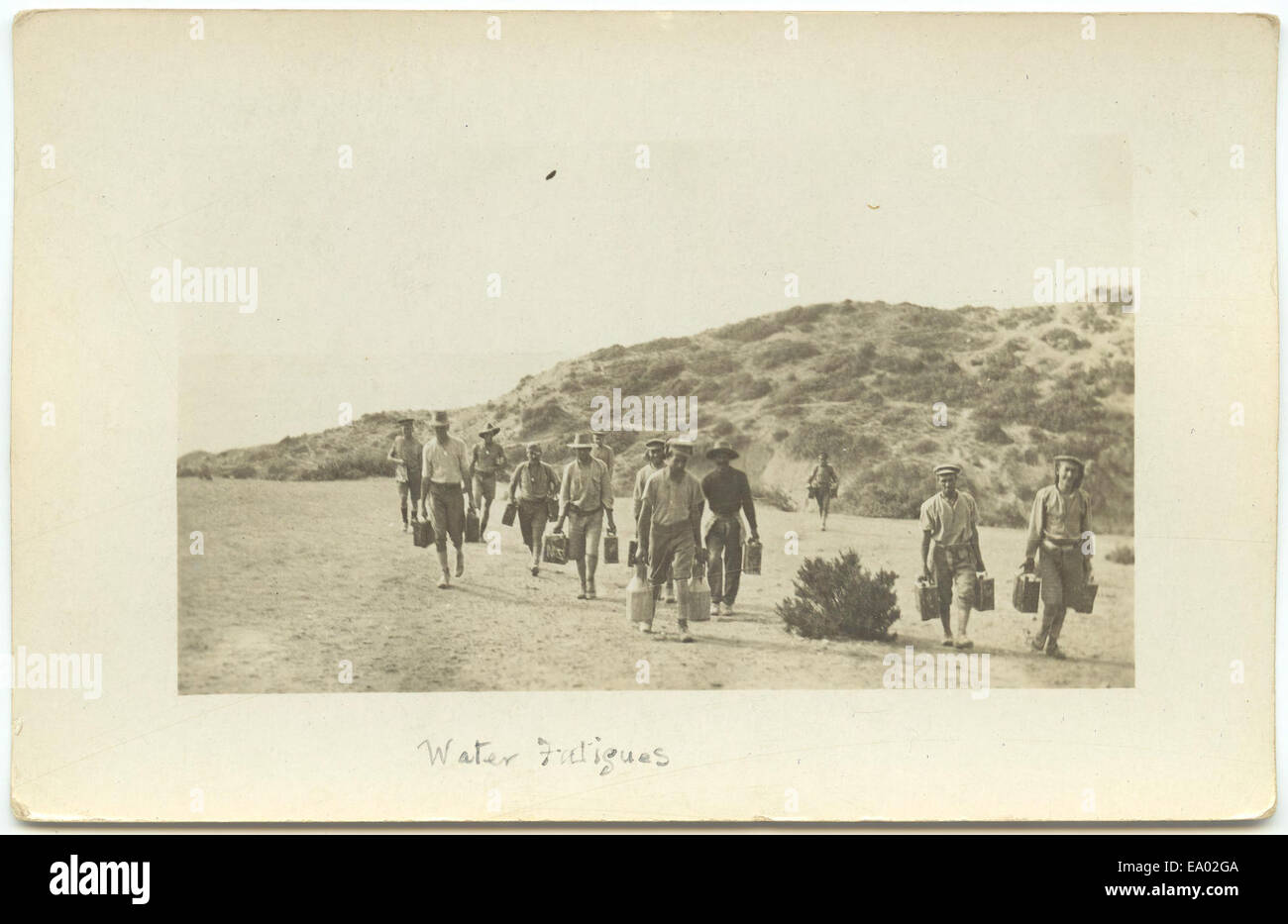 This photograph captures soldiers in water fatigues during the ...