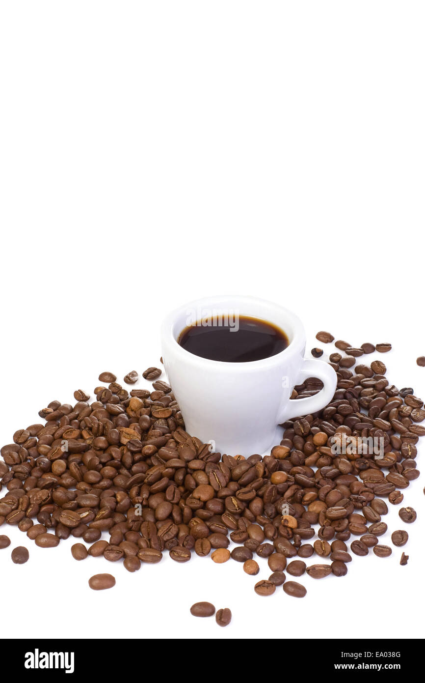 white isolated cup and coffee beans Stock Photo - Alamy