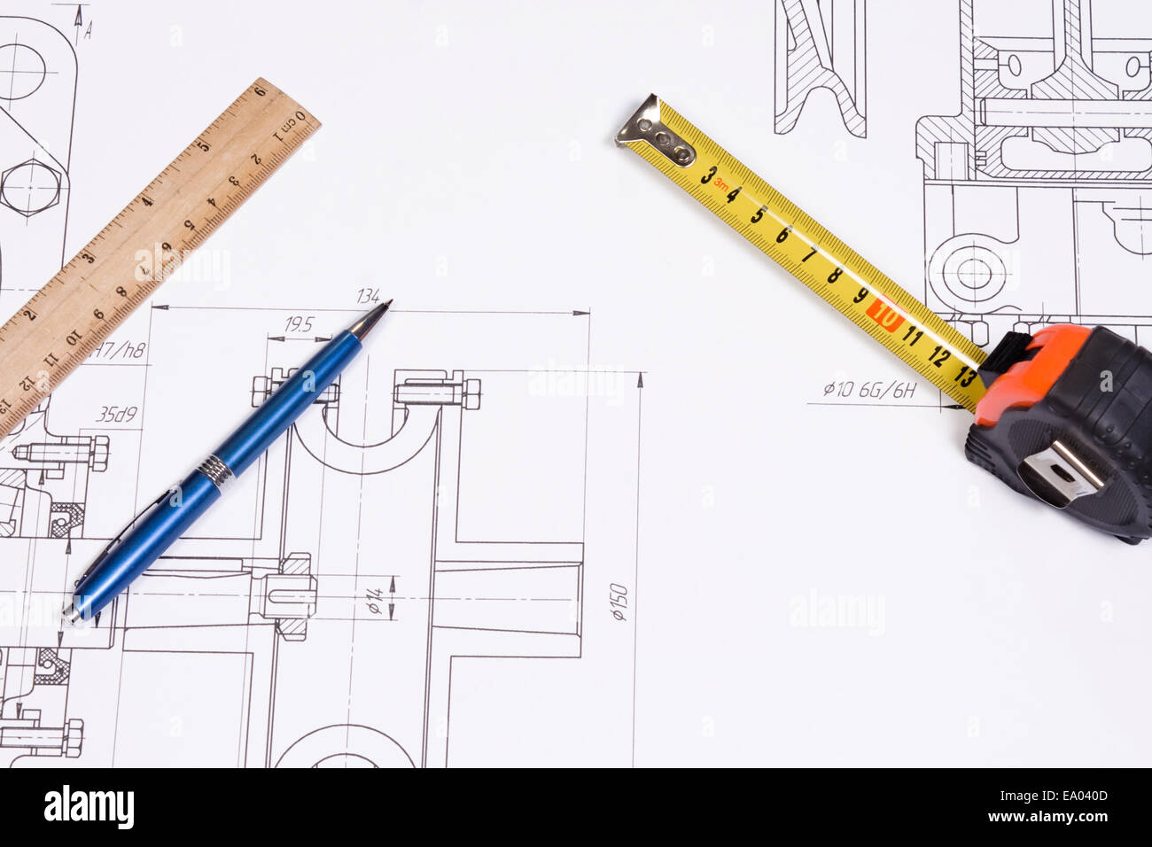 blue pen and wood ruler at draft Stock Photo - Alamy