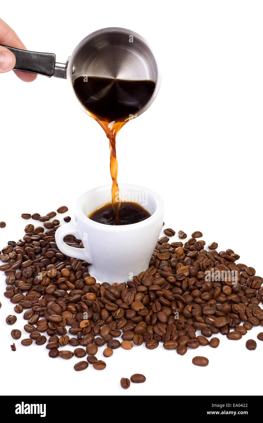 hand pouring coffee in white cup Stock Photo - Alamy