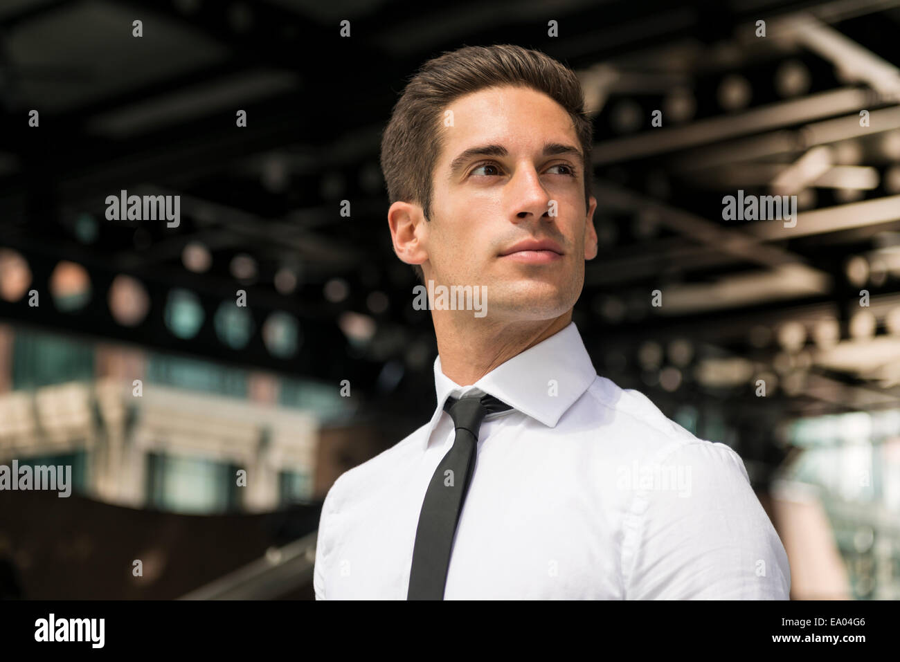 Young confident businessman outside station, London, UK Stock Photo - Alamy