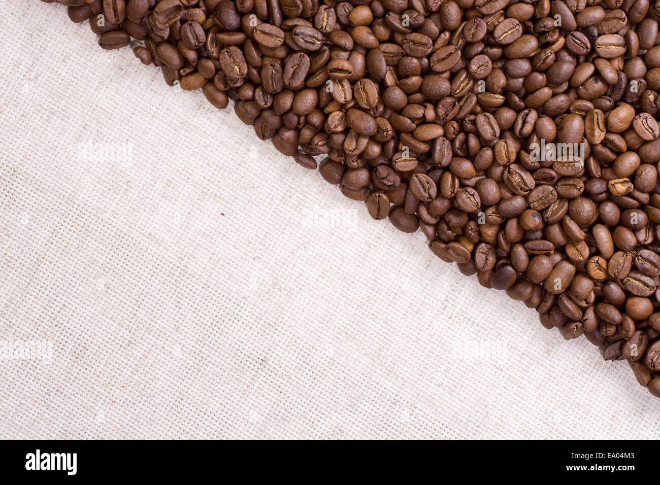 coffee beans at textile material Stock Photo - Alamy