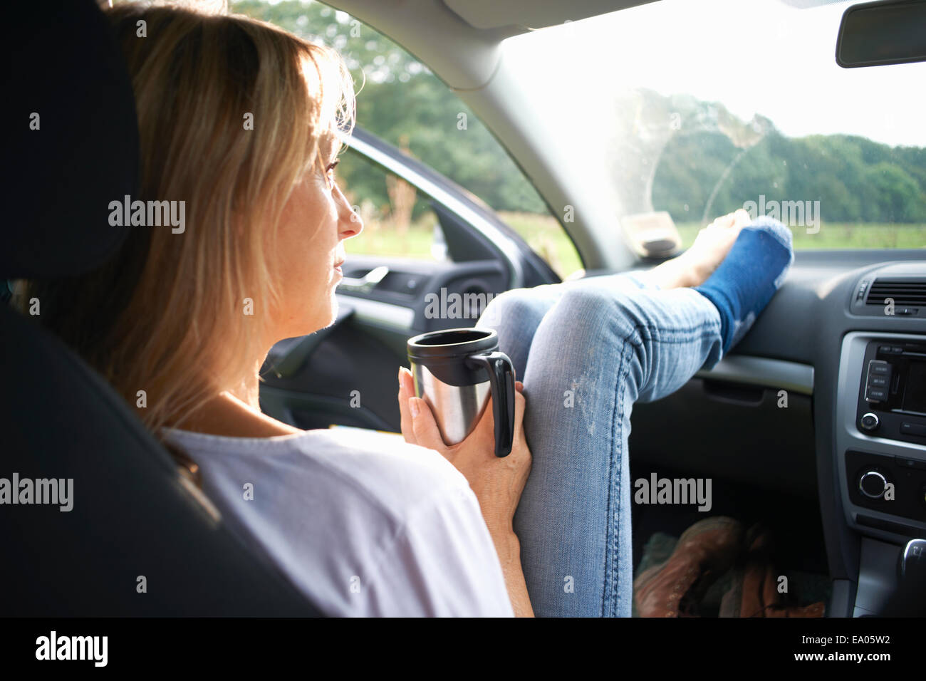 Woman in car legs hi-res stock photography and images - Alamy