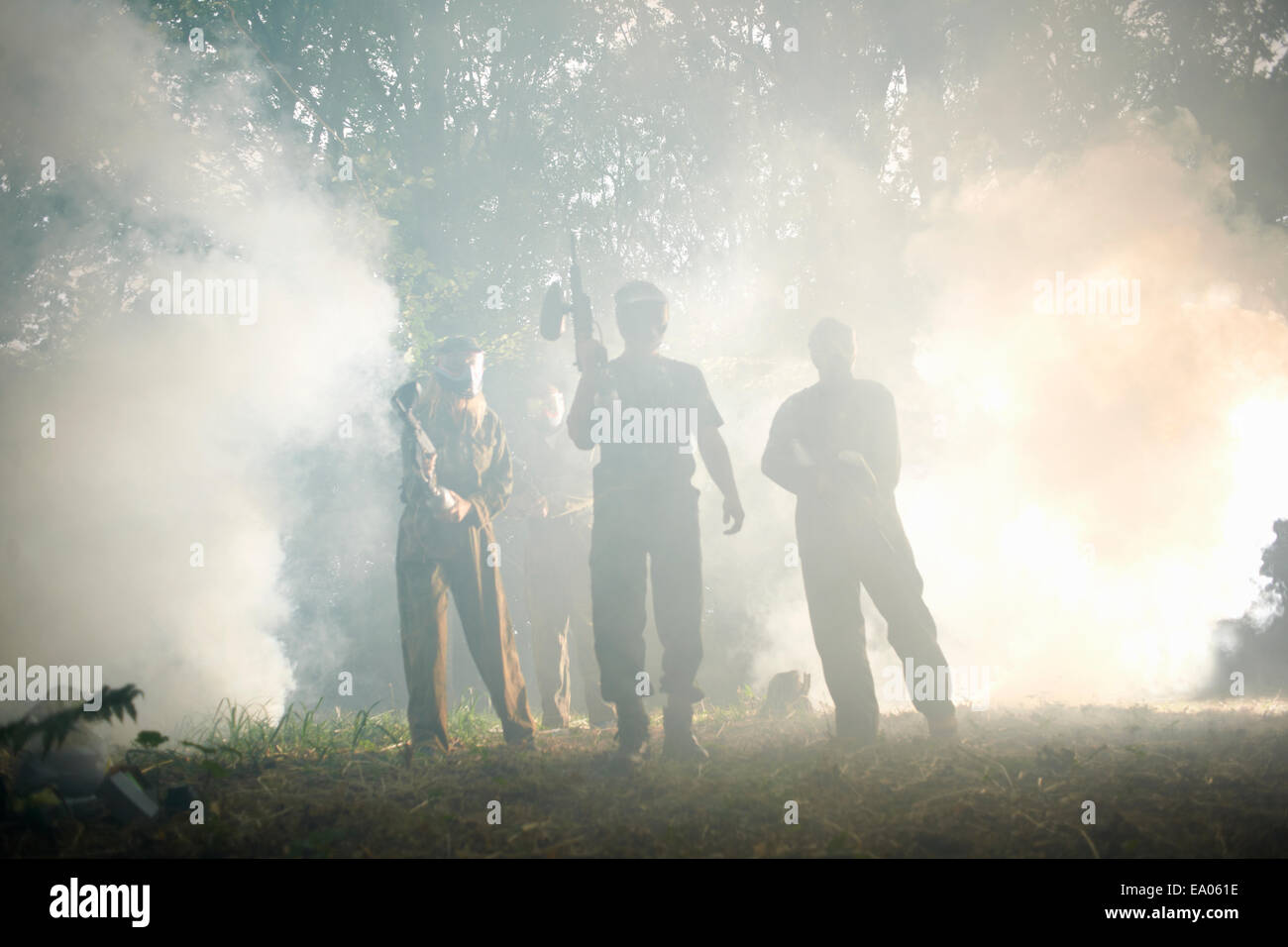 Paintball players in action Stock Photo - Alamy