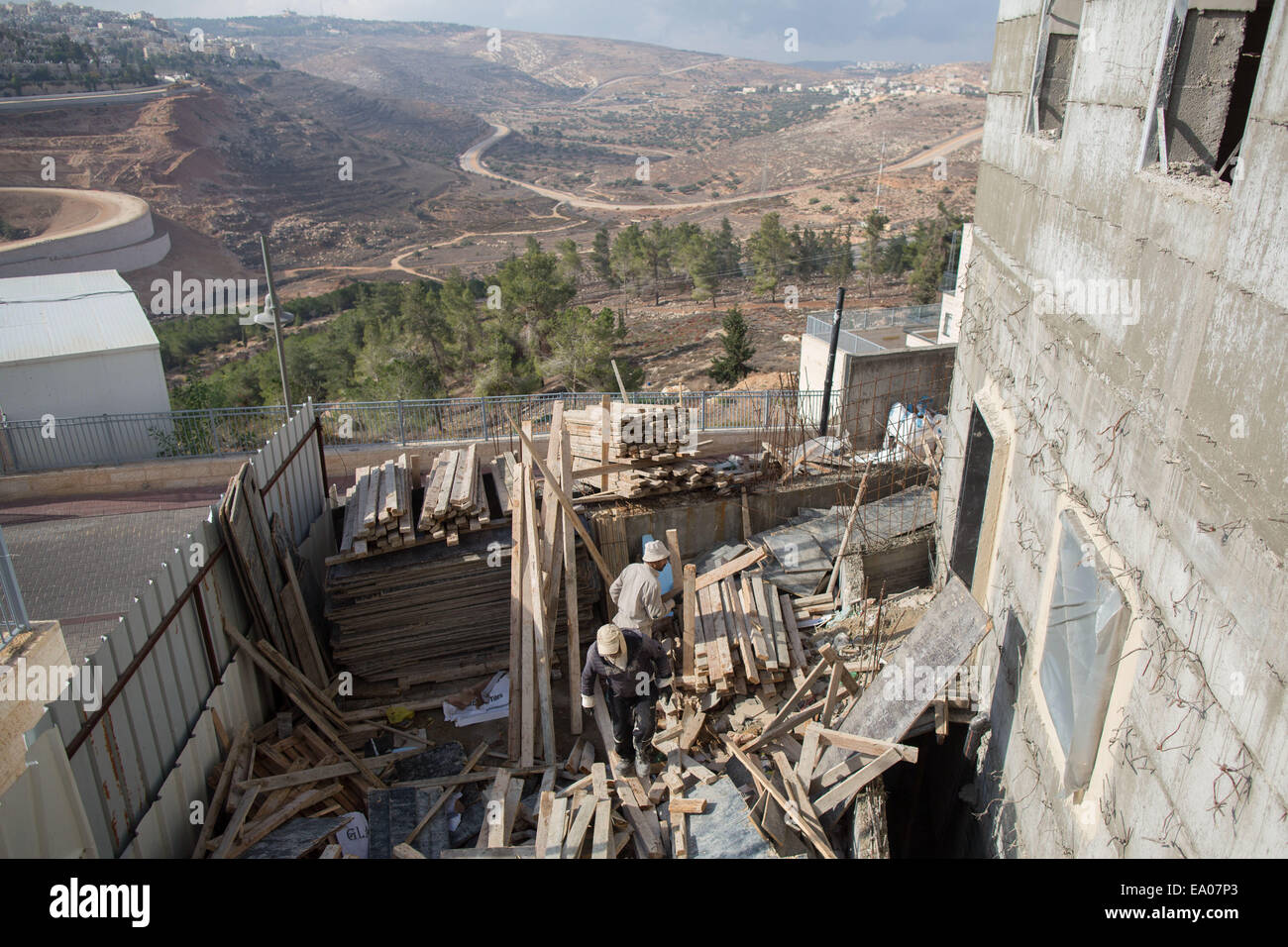 Jerusalem. 4th Nov, 2014. Workers work at a synagogue under ...
