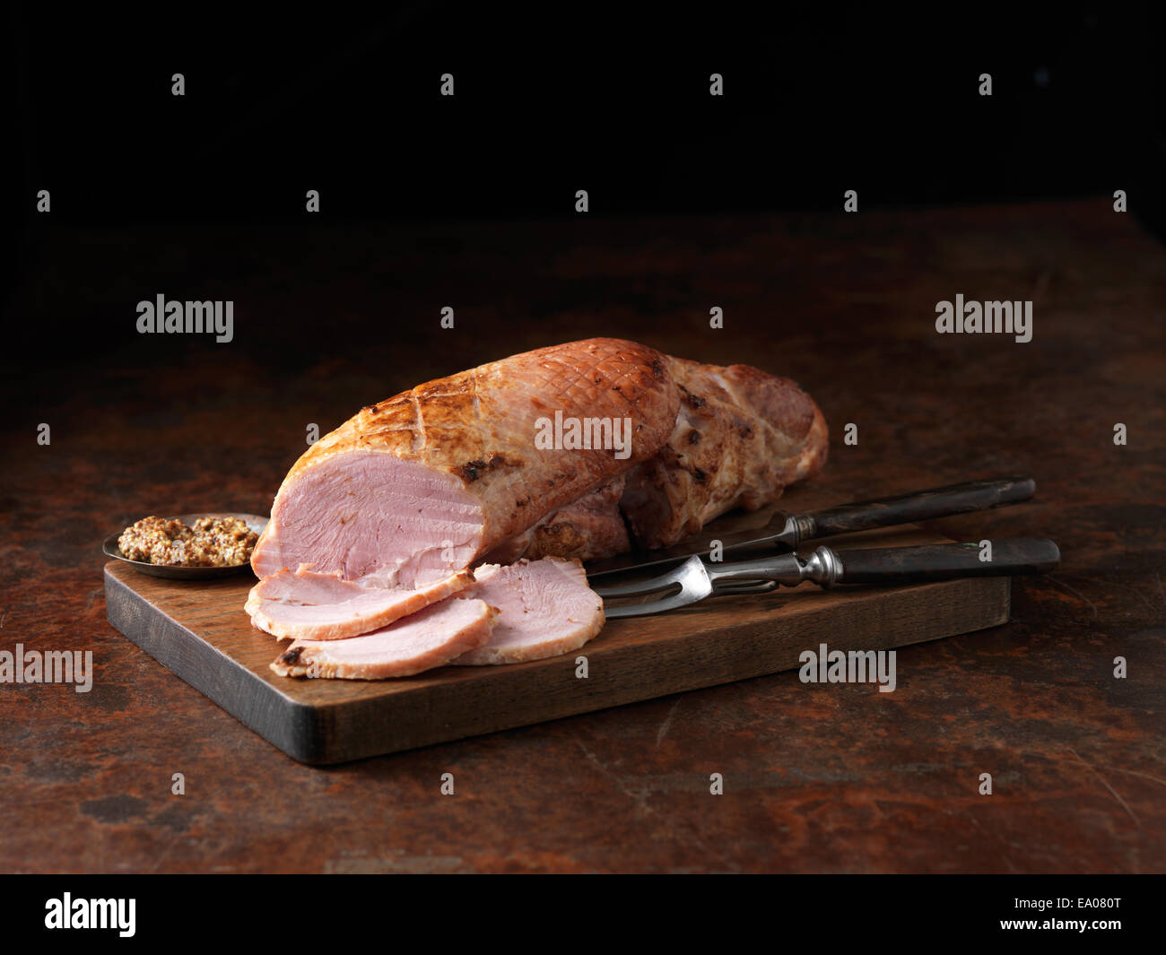 Christmas dinner. Outdoor Wiltshire ham roasted on the bone with ...