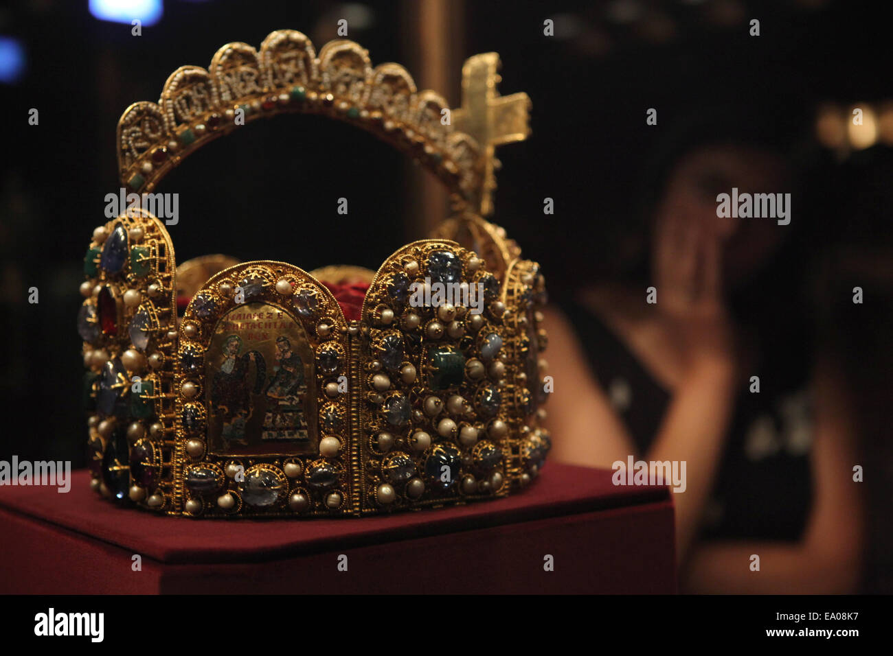 A visitor examines the Imperial Crown of the Holy Roman Empire in the ...