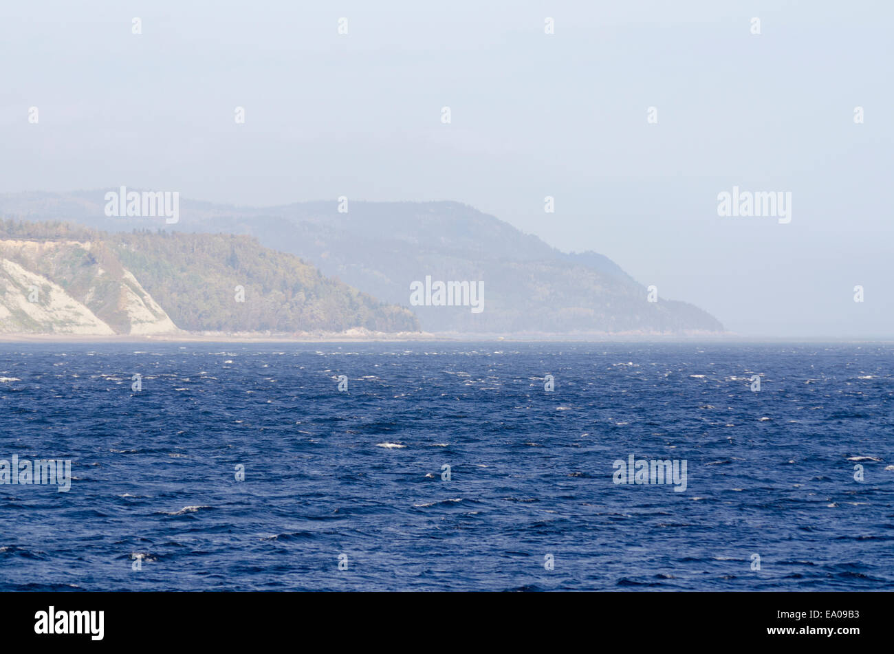 White rock cliff on St. Lawrence river shore Stock Photo - Alamy