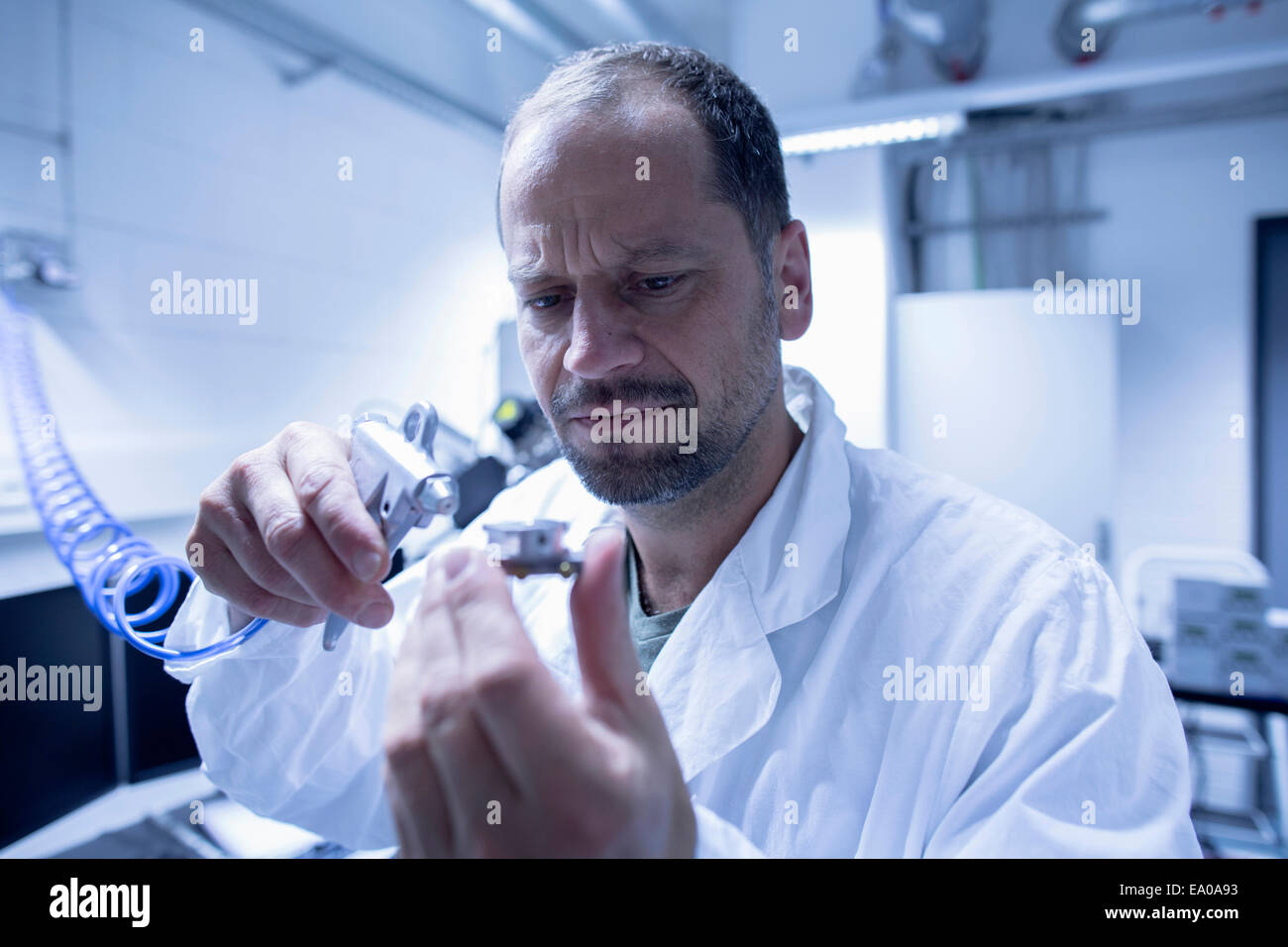 Lab assistant fixing part Stock Photo - Alamy Lab assistant fixing part Stock Photo - Alamy