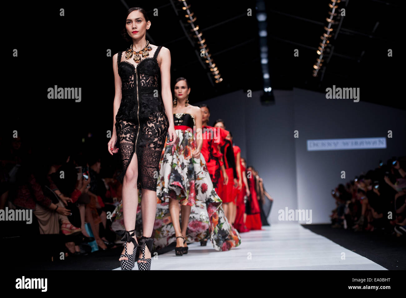 Jakarta, Indonesia. 4th Nov, 2014. Models present creations by designer ...