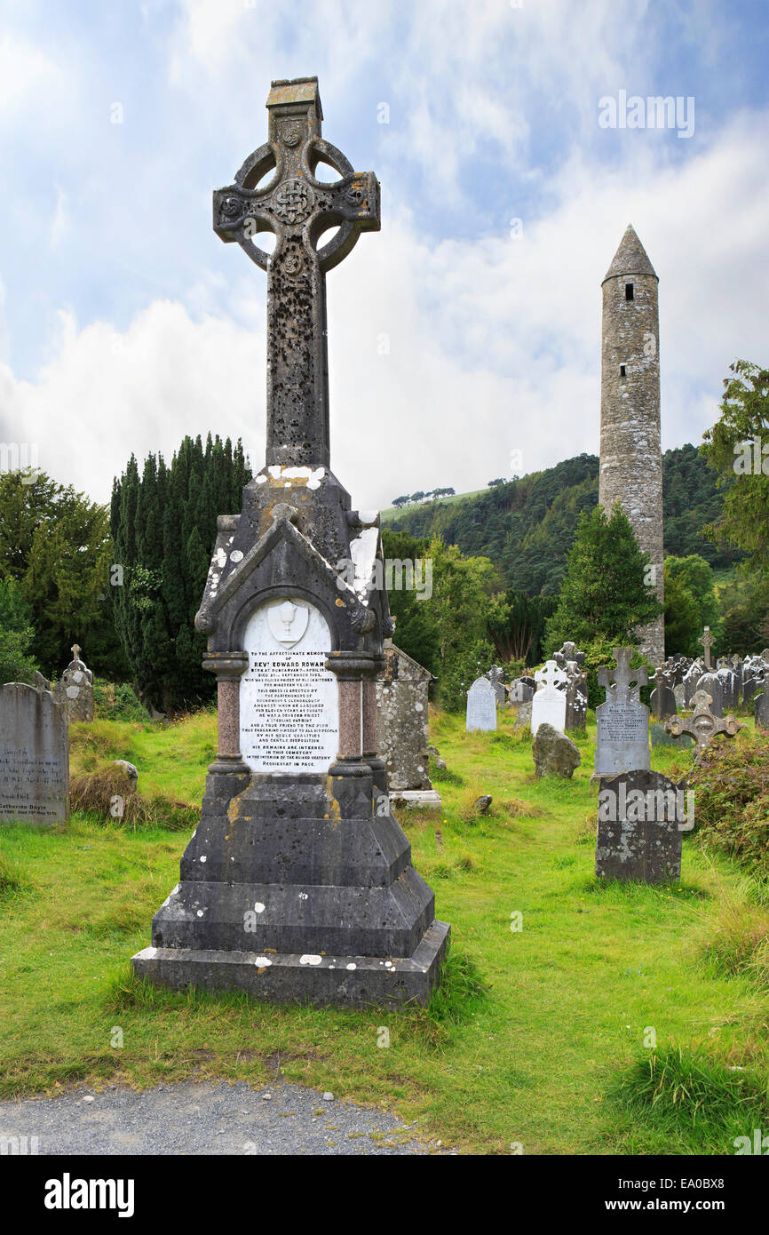 Celtic cemetery and a round tower Stock Photo - Alamy