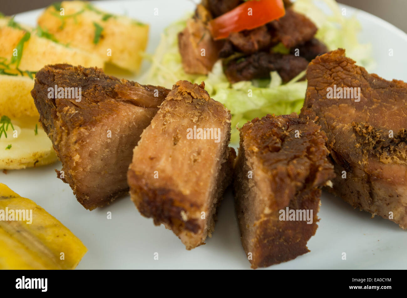 fritada fried pork Ecuadorian plate Stock Photo - Alamy