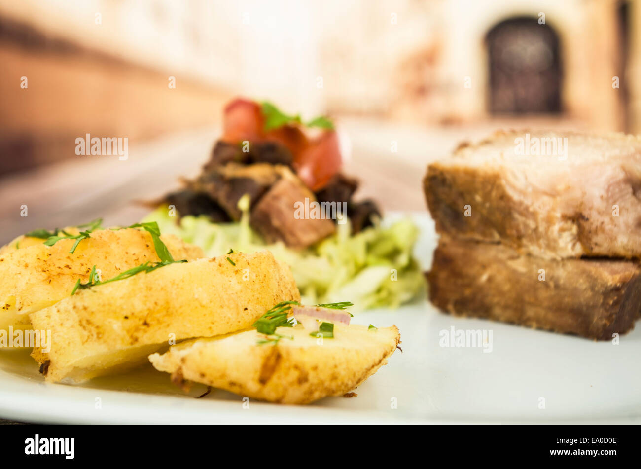 fritada fried pork Ecuadorian plate Stock Photo - Alamy